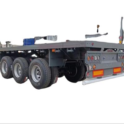 China 40-60ft 3 Axle Flatbed Semi Trailer for Tanzania Shipping Safe and Secure Transport for sale