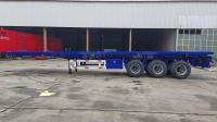 China 40-60ft 3 Axle Flatbed Semi Trailer for Tanzania Shipping Safe and Secure Transport for sale