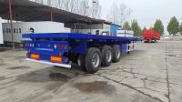 China 40-60ft 3 Axle Flatbed Semi Trailer for Tanzania Shipping Safe and Secure Transport for sale