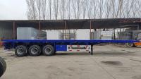 China 20ft 40ft Tri Four Axle 13.5 Meter Flatbed Container Semi-Trailer for Africa Country for sale