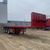 China High Payload 40-60ft 3 Axle Flatbed Semi Trailer for Tanzania Container Shipping for sale