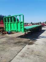 China High Payload 40-60ft 3 Axle Flatbed Semi Trailer for Tanzania Container Shipping for sale
