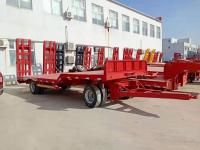 China Buyer's Request 30 ton lowboy heavy duty chassis towing trailer for Asia and Africa for sale
