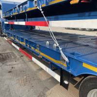 China 3 Axis 4 Axle 60 80 100 Tons Lowbed Semi Trailer for Transporting Construction Vehicles for sale