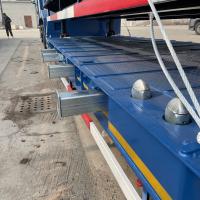 China 3 Axis 4 Axle 60 80 100 Tons Lowbed Semi Trailer for Transporting Construction Vehicles for sale