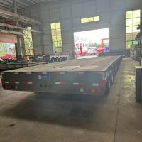 China Max Payload 100TON Semi-Trailer 6 Axles Flat Track Trailer for Heavy Cargo Transport for sale