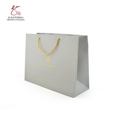 China Custom CMYK Printed Paper Gift Bags with Handles 500 Pcs Min Order for sale