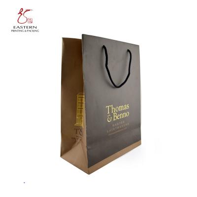China Custom Printed Brown Kraft Paper Gift Bags 250mm Length with Handles for sale
