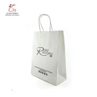 China Custom CMYK Printed Recyclable White Paper Gift Bags 210gsm with Handles for sale
