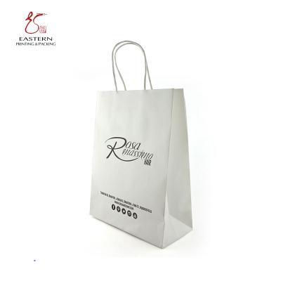 China Custom CMYK Printed Recyclable White Paper Gift Bags 210gsm with Handles for sale
