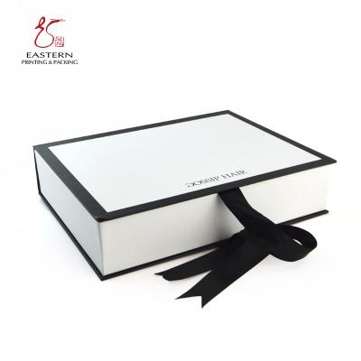China Custom Hard Cardboard Book Style Gift Box 5.5cm Height with Black Ribbon Closure for sale