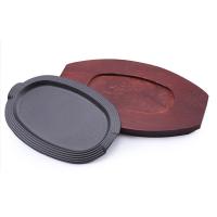 China Oval Cast Iron Sizzler Plate 27x17cm with Wooden Base for Home Restaurant Use for sale