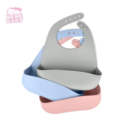 China Heart Shape Baby Feeding Silicone Catch Bib Non Toxic Soft Washable for sale