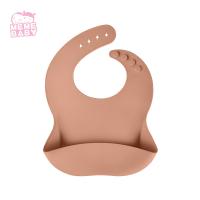 China Button Closure Anti Bacterial Food Catching Bib For Toddlers for sale