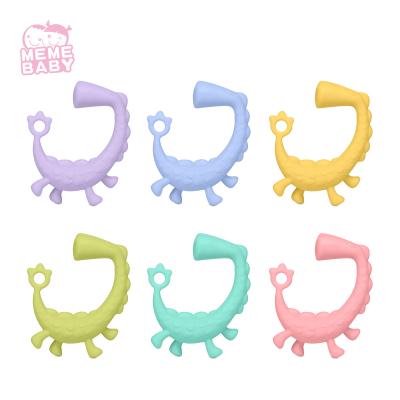 China Bpa Free Funny Dinosaur Chew Silicone Baby Teether For Toddler for sale