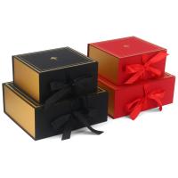 China Custom Logo Print Paper Cardboard Foldable Magnetic Shopping Gift Box With Ribbon for sale