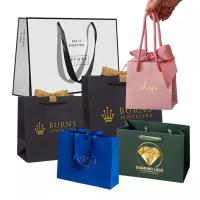 China Customized Ribbon Handle Boutique Jewellery Gift Gold Foil Logo Shopping Paper Bags For Hair Extension for sale