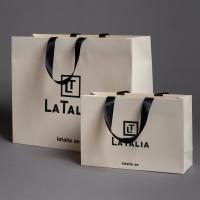 China Custom Luxury Gift Garment Paper Shopping Bags With Logo Print for sale