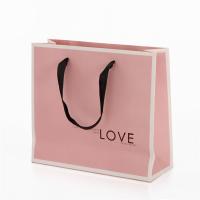 China Personalised Pink Branded Paper Gift Bags With Black Ribbon Handles for sale