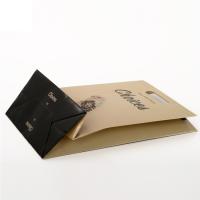 China Custom Printed Paper Bags Gift Packaging With Die Cut Patch Handle for sale