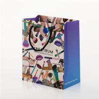 China Fashionable Full Color Printed Paper Bags For Cosmetic Products Packaging for sale