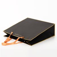 China Luxury Hot Stamping Printed Paper Shopping Bags With Ribbon Handle Custom Size for sale
