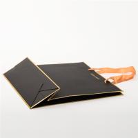 China Luxury Hot Stamping Printed Paper Shopping Bags With Ribbon Handle Custom Size for sale