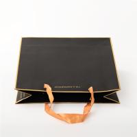 China Luxury Hot Stamping Printed Paper Shopping Bags With Ribbon Handle Custom Size for sale
