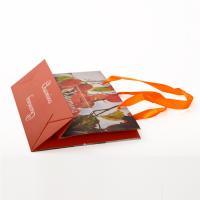 China Reusable Paper Carrier Bags Custom Logo Printed With Ribbon Handle for sale
