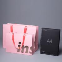 China Custom Printing Branded Logo Retail Paper Shopping Bags With Ribbon Handles for sale