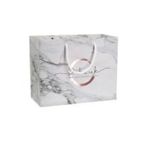 China Custom Rose Gold Marble Boutique Gift Paper Carry Bags With Logo Printed for sale