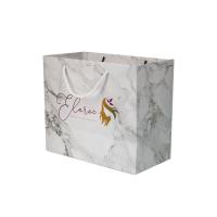 China Custom Rose Gold Marble Boutique Gift Paper Carry Bags With Logo Printed for sale