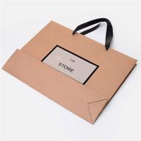 China China Wholesale Custom Luxury Designed Paper Kraft Bags With Logo for sale