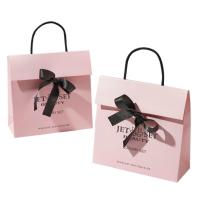 China Custom Printing Paper Boutique Pink Gift Bag Popular Shopping Packaging Shipping Bag For Clothing Apparel for sale