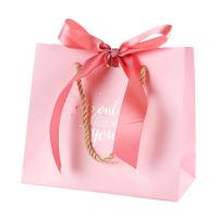 China Custom Printing Paper Boutique Pink Gift Bag Popular Shopping Packaging Shipping Bag For Clothing Apparel for sale
