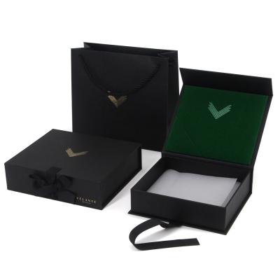 China Custom Printed Cell Moblie Phone Case Black Magnetic Packaging Gift Box With Ribbon for sale