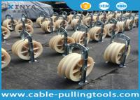 China Large Diameter Triple-Sheave Stringing Block with Nylon Wheels for Bundled Conductor Transmission Lines for sale