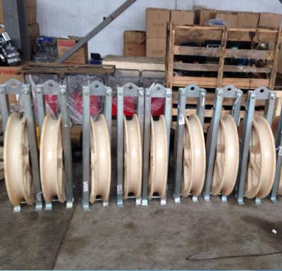 China 660mm Large-Diameter Fiber Optic Cable Stringing Pulley Block with Heavy-Duty Steel Frame and Nylon/Aluminium Wheel for sale