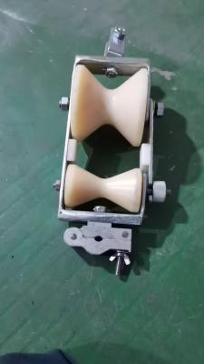 China Double Pulley Stringing Block with 2kN Rated Load and Lightweight Design for OPGW ADSS Cable Installation for sale