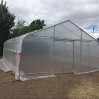 China Plastic Film High Tunnel Single Span Greenhouse Steel Frame 9x30m for sale