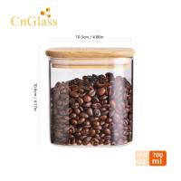 China Modern Living Essential CnGlass Clear Airtight Food Storage Jar with Bamboo Lid 700ml for sale
