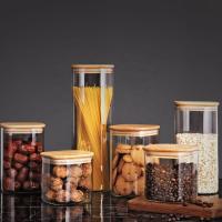 China Modern Living Essential CnGlass Clear Airtight Food Storage Jar with Bamboo Lid 700ml for sale