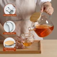 China CnG40.6oz. Heat Resistant Glass Tea Pot Borosilicate Glass Teapot With Airtight Bamboo Lid Loose Leaf Tea Pot With Strainer for sale