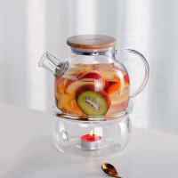 China CnGlass Hot Sale Glass Teapot wholesale  600ml Glass Kettle With Warmer Borosilicate Tea Pot Set Glass Pitcher With Bamboo Lid for sale