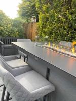China Mail Packing AJUNION All Weather Outdoor Dining Set with Firepit Table for sale