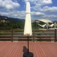 China Custom Logo Outdoor Cafe Garden Beach Patio Sun Umbrella with 3 Tiers and LED Lights for sale