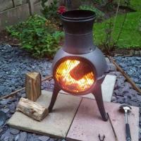 China Metal Outdoor Patio Backyard Garden Camping Heavy Duty Steel Wood Burning Firepit Charcoal Fire Pit Fireplace Chimenea with Rain Cap for sale