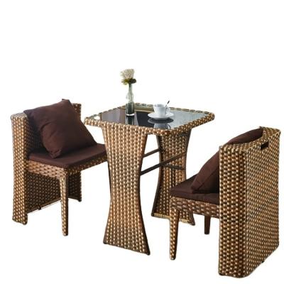 China Outdoor Rattan Furniture for Coffee Shop Tempered Glass Top Table and Chair Set for sale