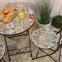 China AJUNION 3pcs Outdoor Bistro Metal Table Chair Set Antique Mosaic Ceramic for Garden for sale
