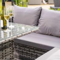 China Add Elegance to Your Garden with AJUNION Wicker Woven Sofa Set and Fire Pit Table for sale